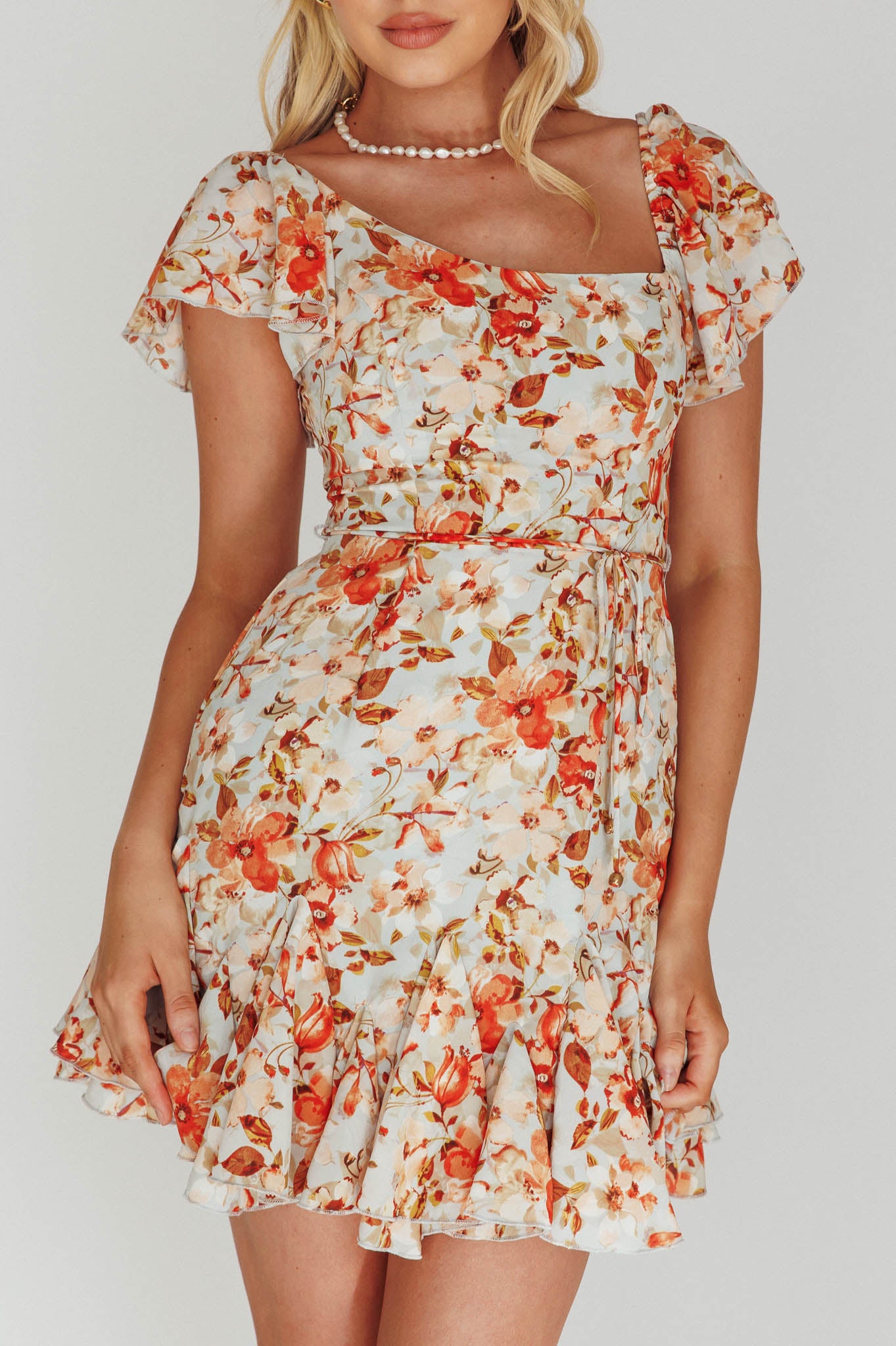 Shop the Diandre Godet Hem Mini Dress Floral Orange