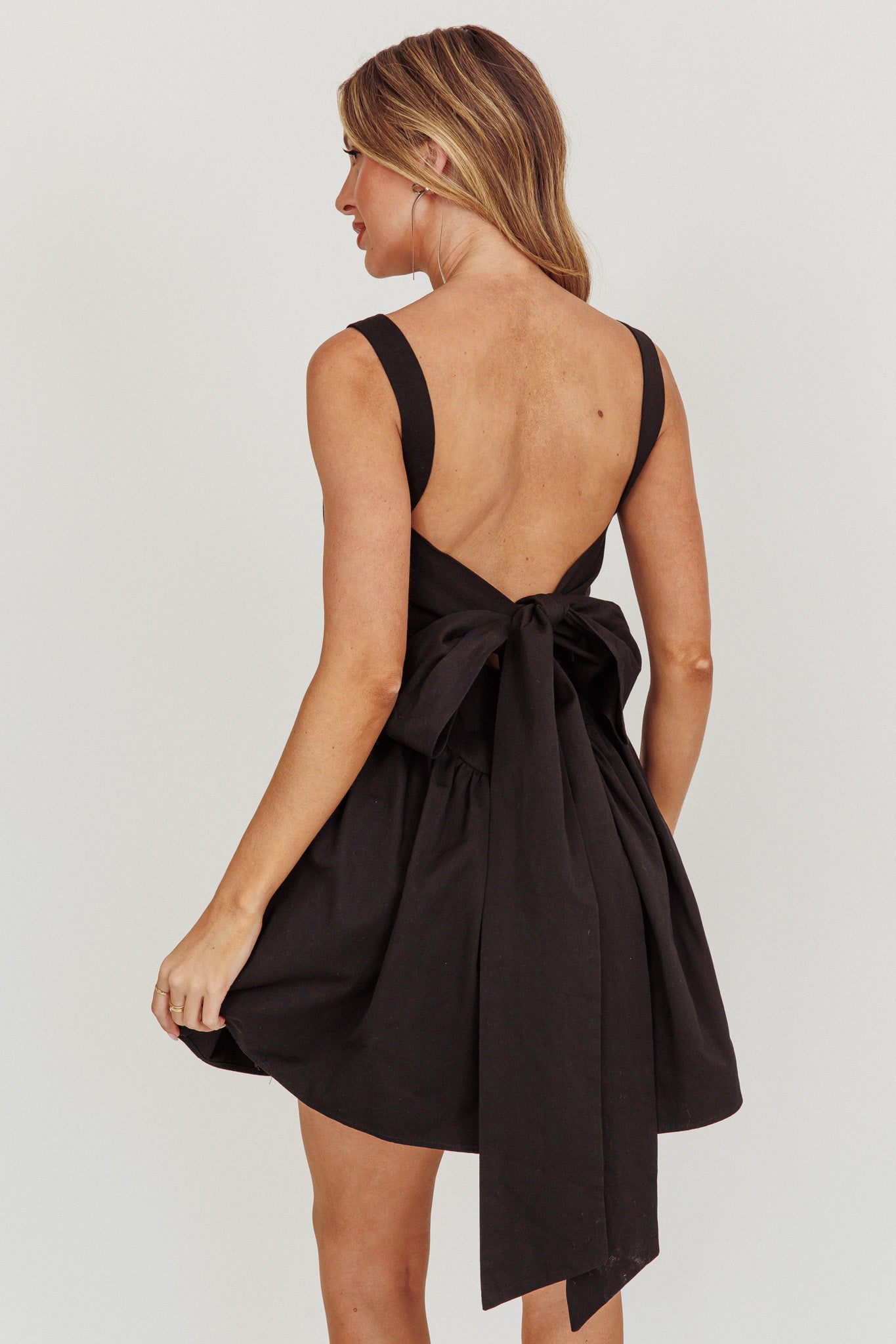Shop the Irenic Bow Flare Mini Dress Black